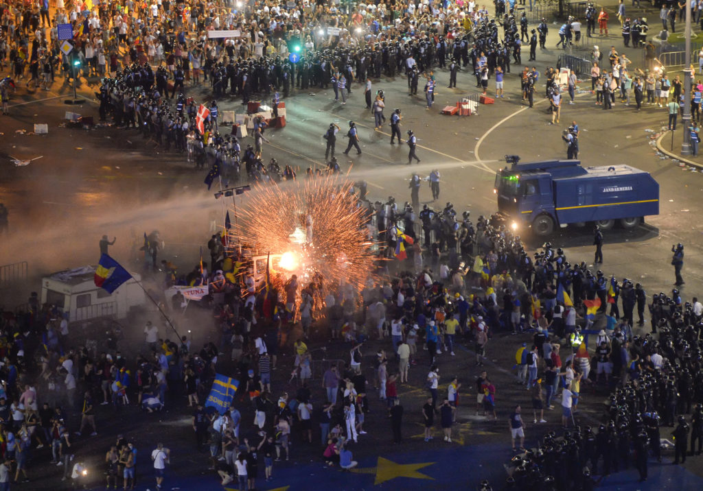 The Pic of the Day: Riot police square off with protestors in Bucharest ...