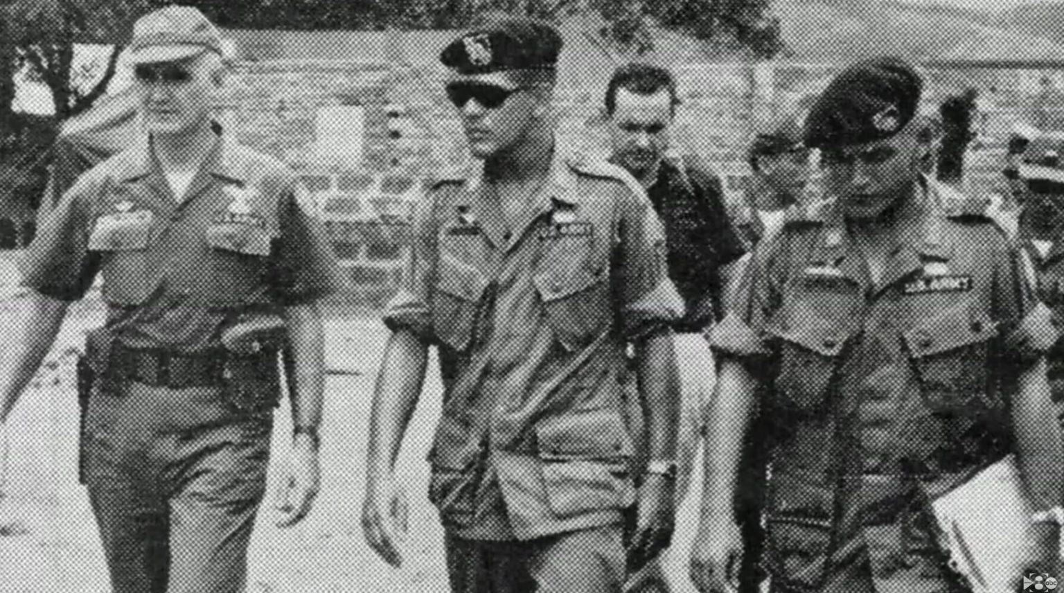 Captain Paris Davis, center, rocking the shades, is shown here giving a ...
